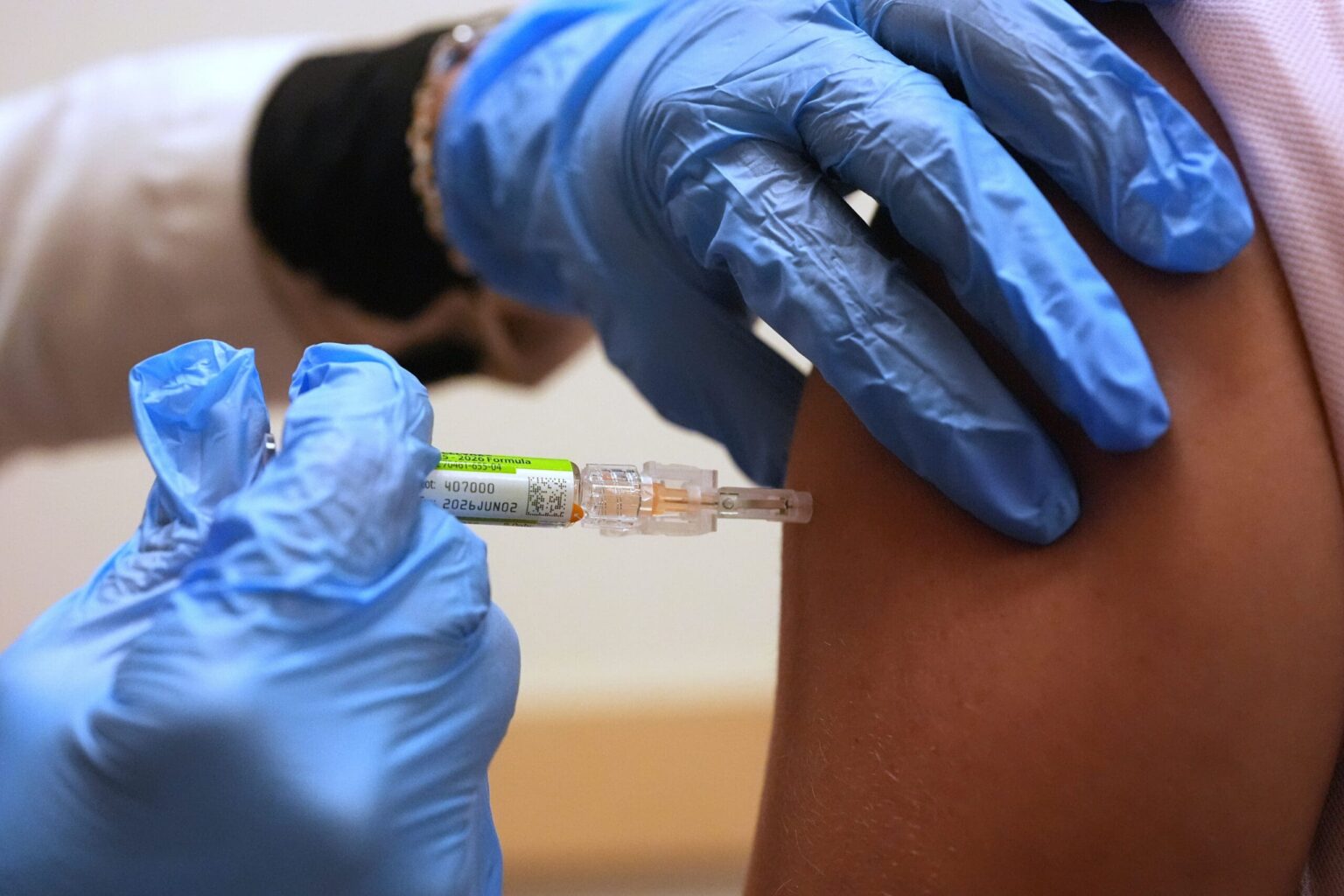 Flu Cases Surge in Michigan Amid Federal Vaccine Rollback